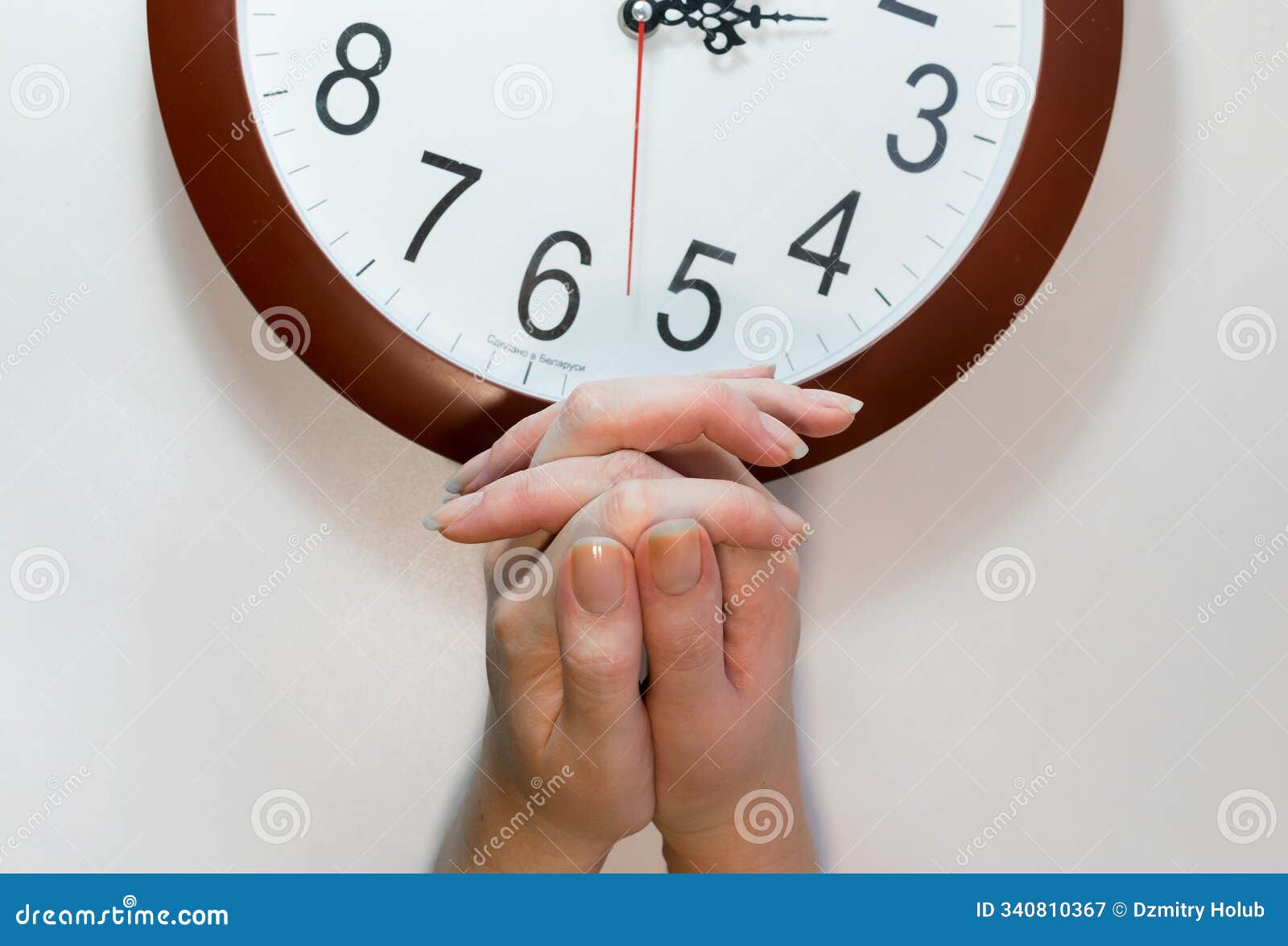 The Man Folded His Hands and Placed Them in Front of the Clock Face ...