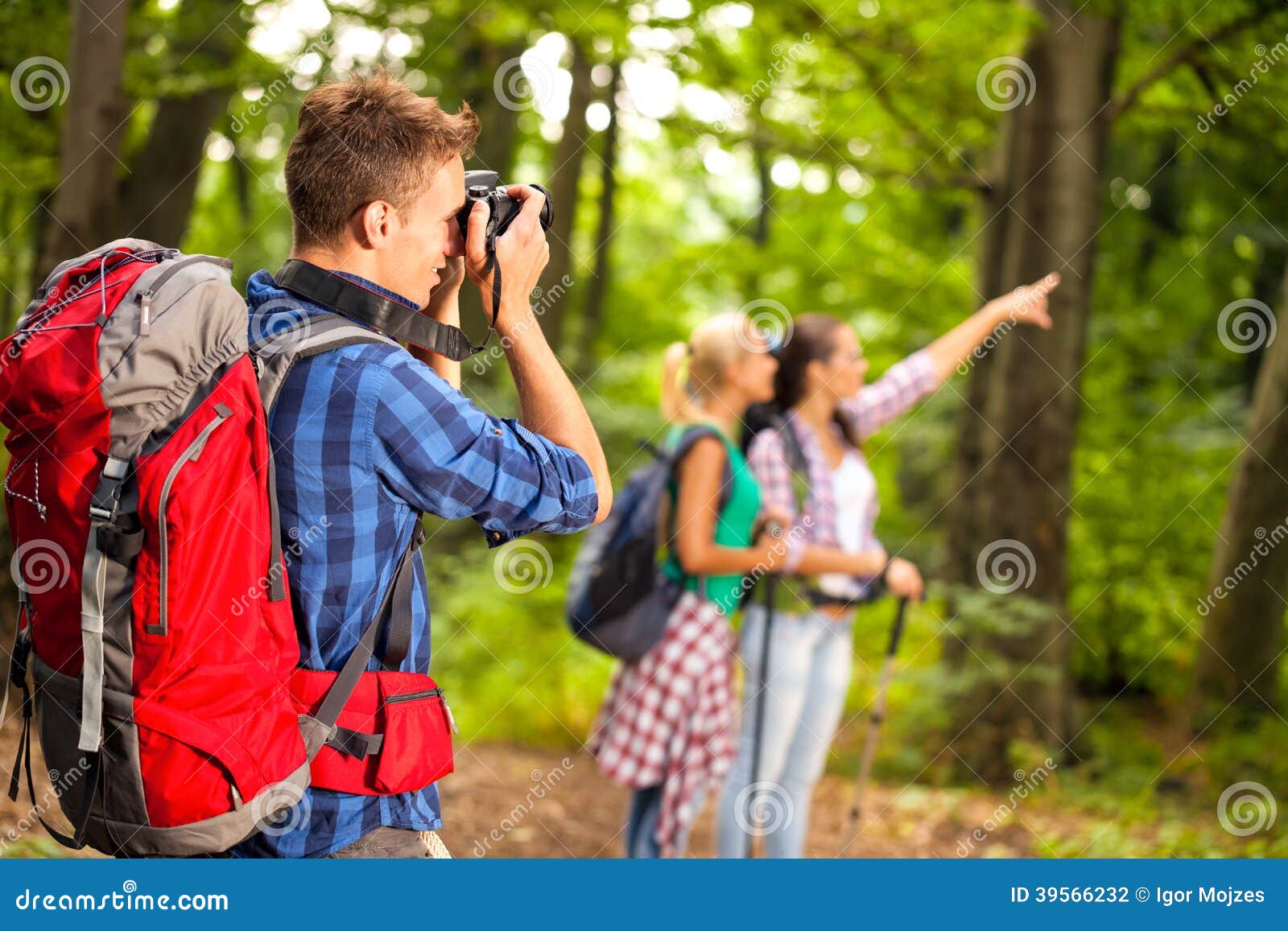 Man in forest with camera stock photo. Image of landscape - 39566232