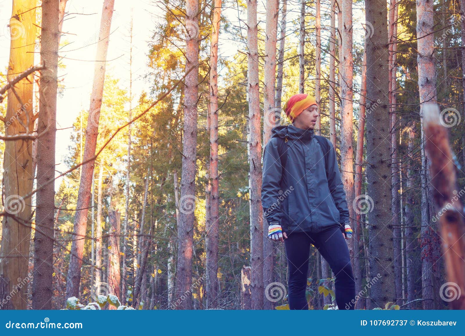 Man in forest stock image. Image of adventure, evening - 107692737