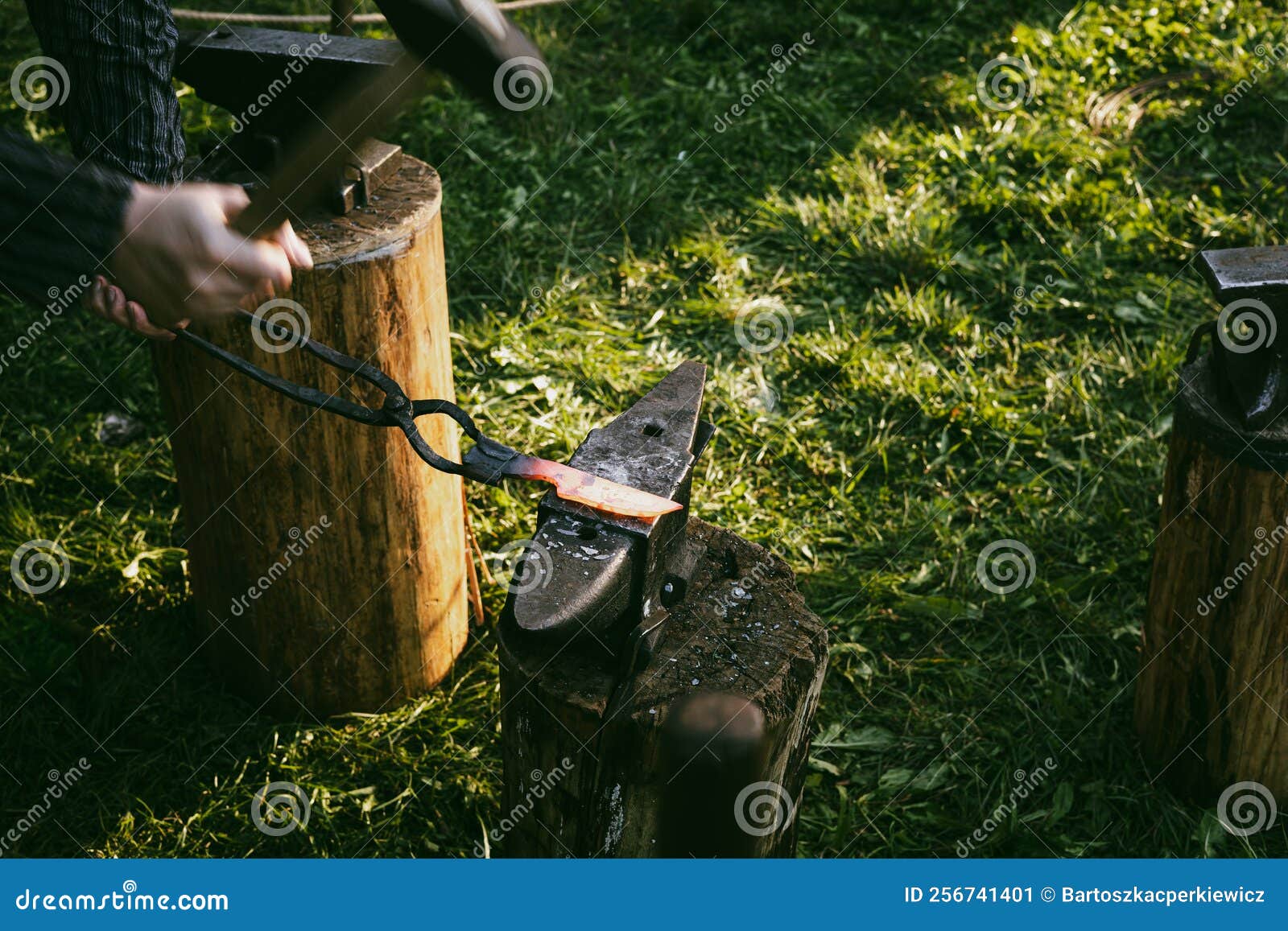A Man Forging a Knife, Blacksmith S Workshop in the Open Air Stock ...
