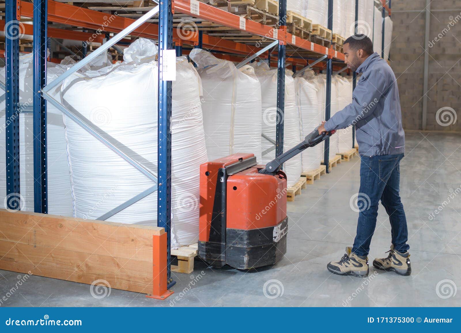 Man on Forklift Loading Boxes at Warehouse Stock Photo - Image of ...