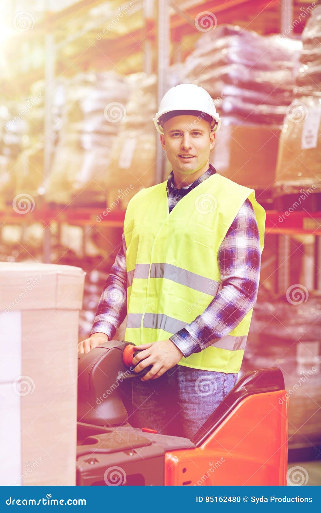 Man on Forklift Loading Boxes at Warehouse Stock Photo - Image of ...