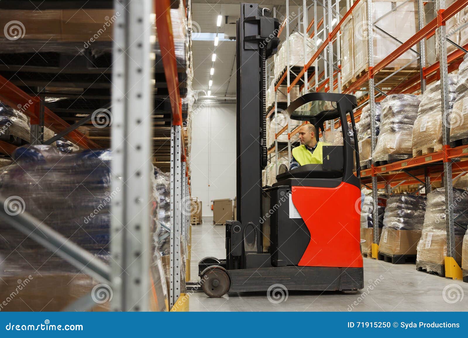 Man on Forklift Loading Cargo at Warehouse Stock Photo - Image of ...