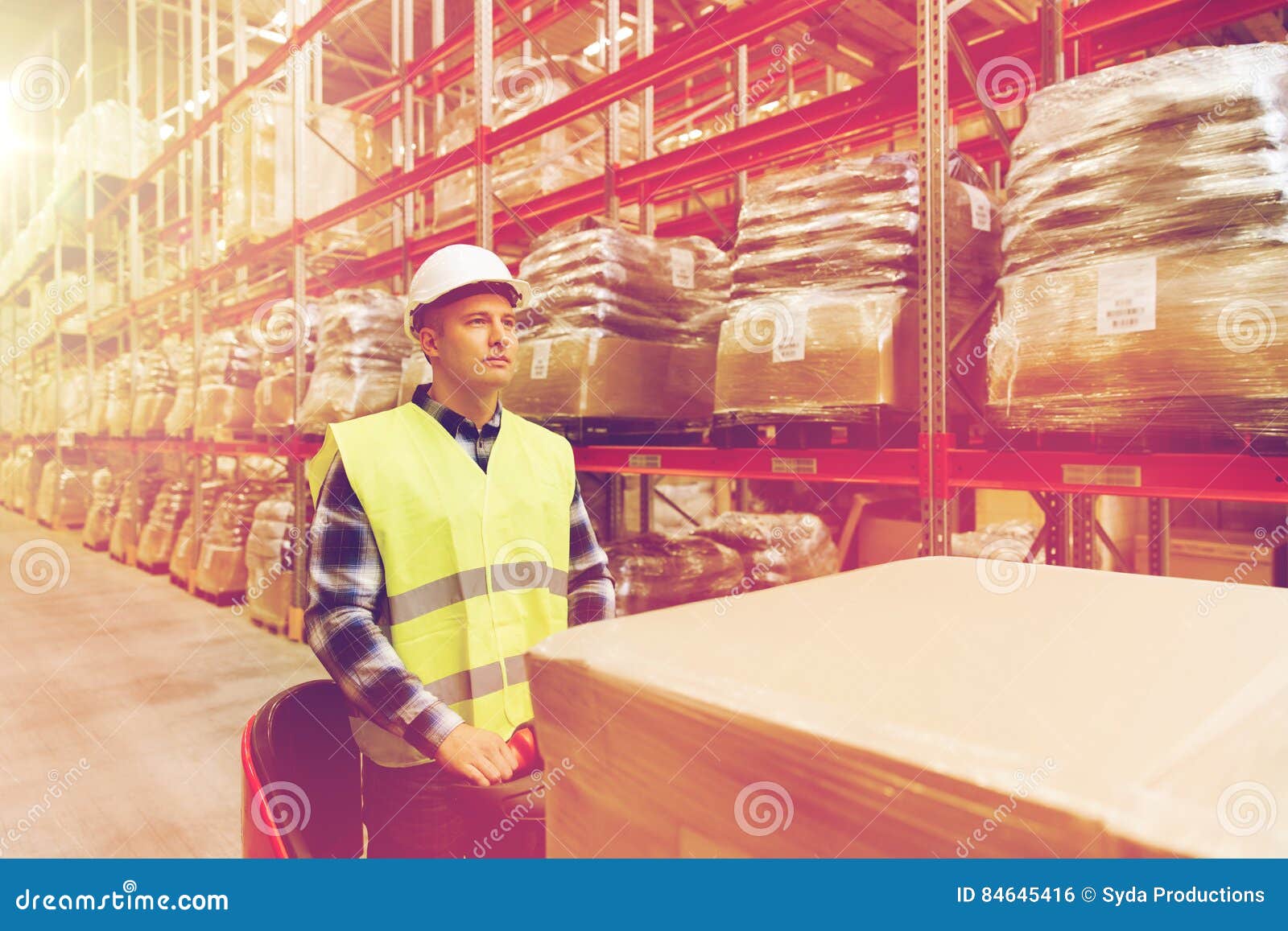 Man on Forklift Loading Cargo at Warehouse Stock Photo - Image of ...
