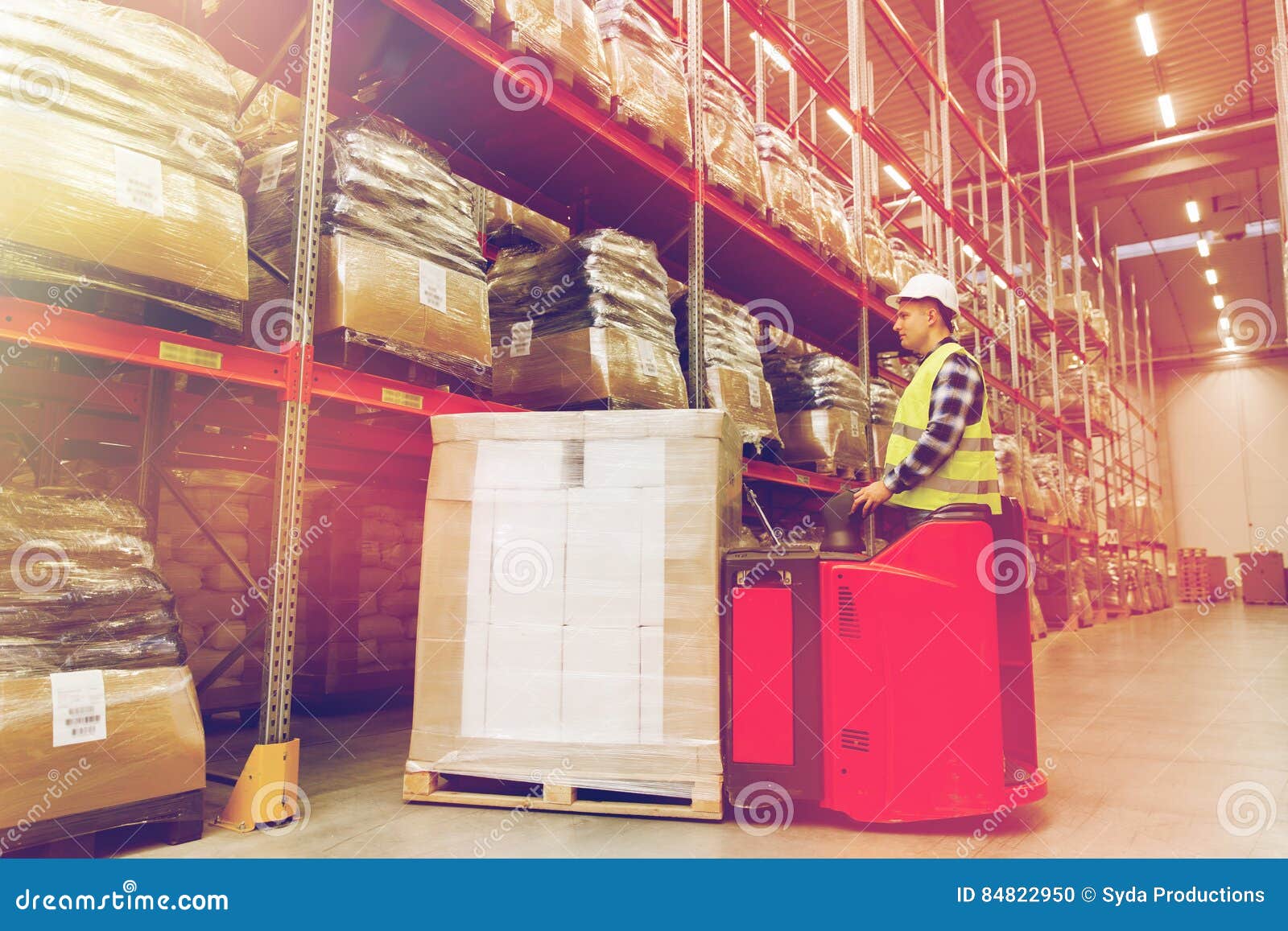 Man on Forklift Loading Cargo at Warehouse Stock Photo - Image of ...