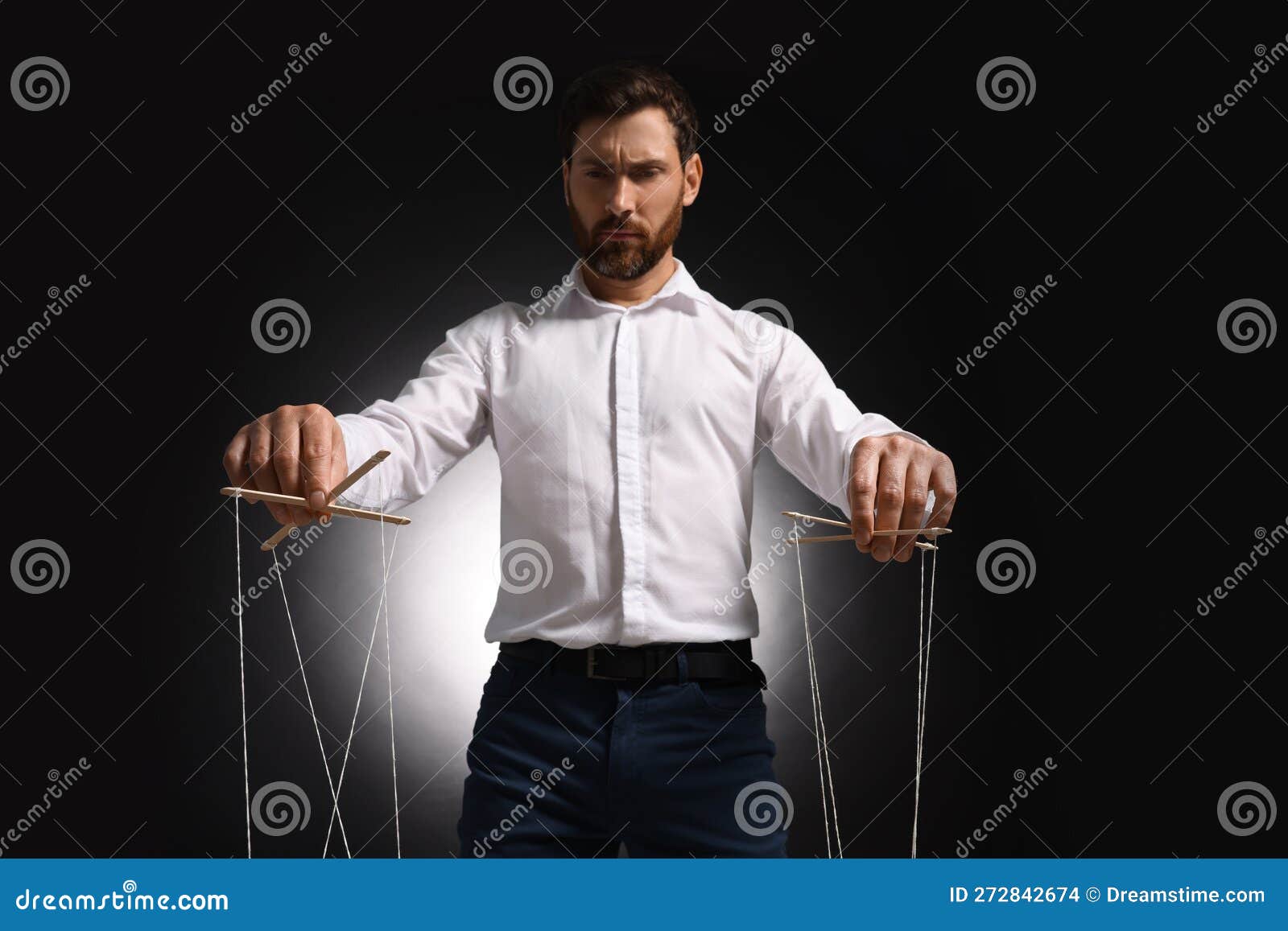 Man in Formal Outfit Pulling Strings of Puppet on Dark Background, Low ...