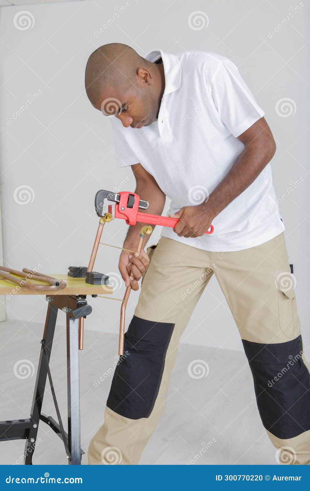 Man forming pipe system stock photo. Image of heating - 300770220