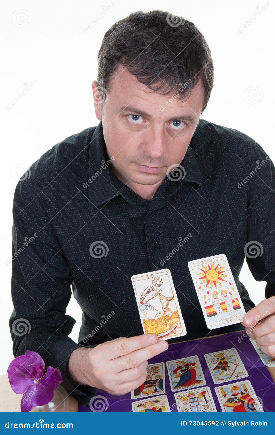 Man Fortune Teller Using Tarot Cards on Purple Table Stock Photo ...