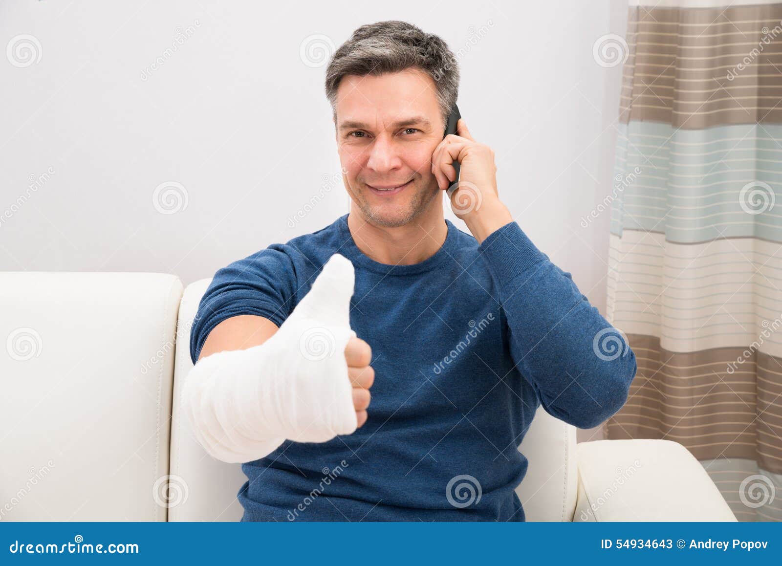 Man with Fractured Hand Showing Thumb-up Stock Image - Image of injured ...