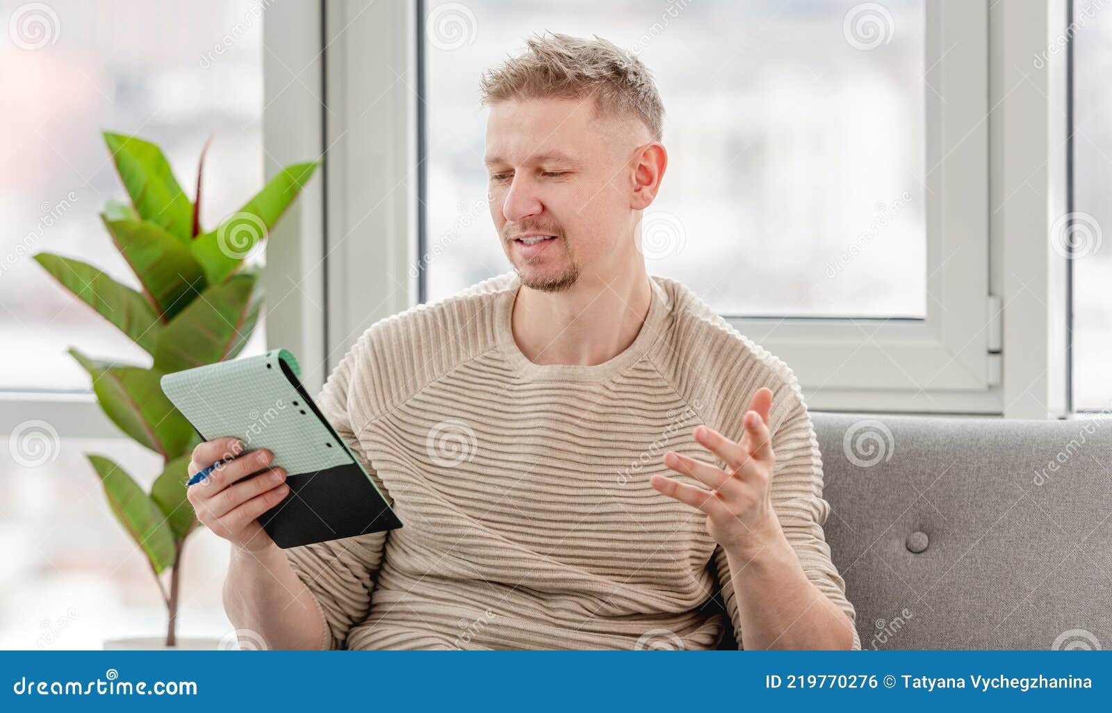 Man Freelancer with Notepad Stock Photo - Image of businessman ...