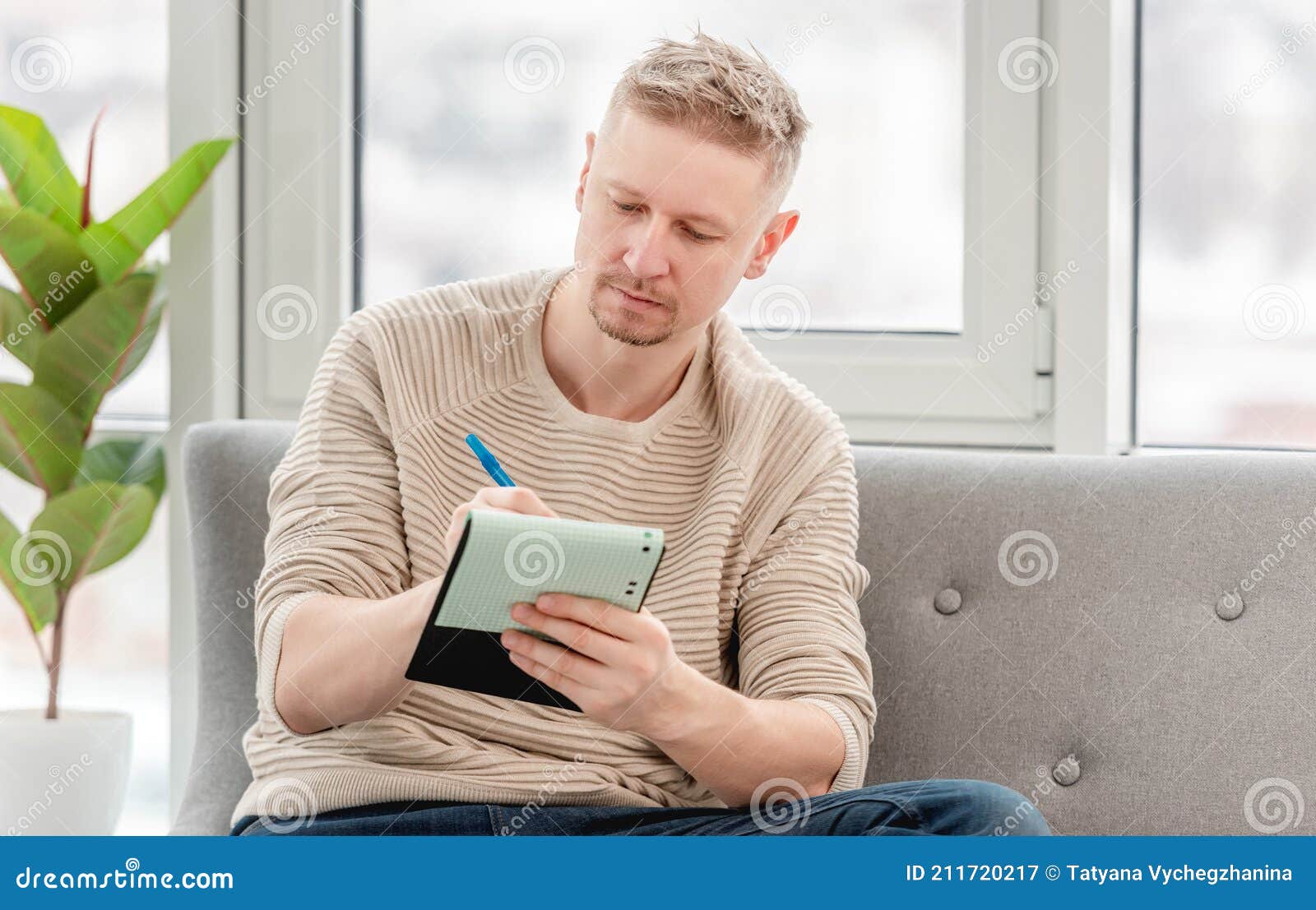 Man Freelancer with Notepad Stock Image - Image of modern, note: 211720217