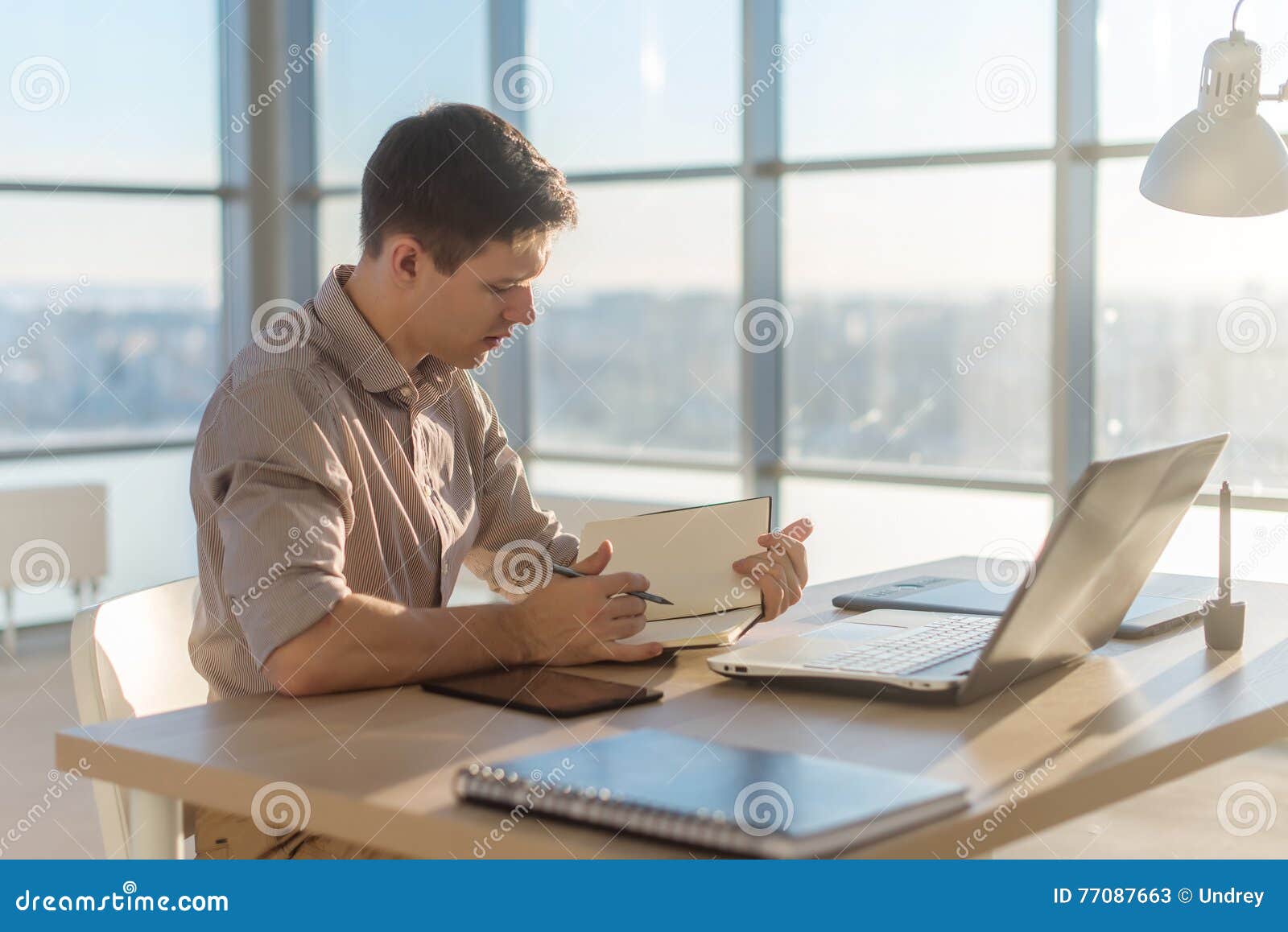 Man Freelancer Writing on Notebook at Home or Office. Stock Image ...
