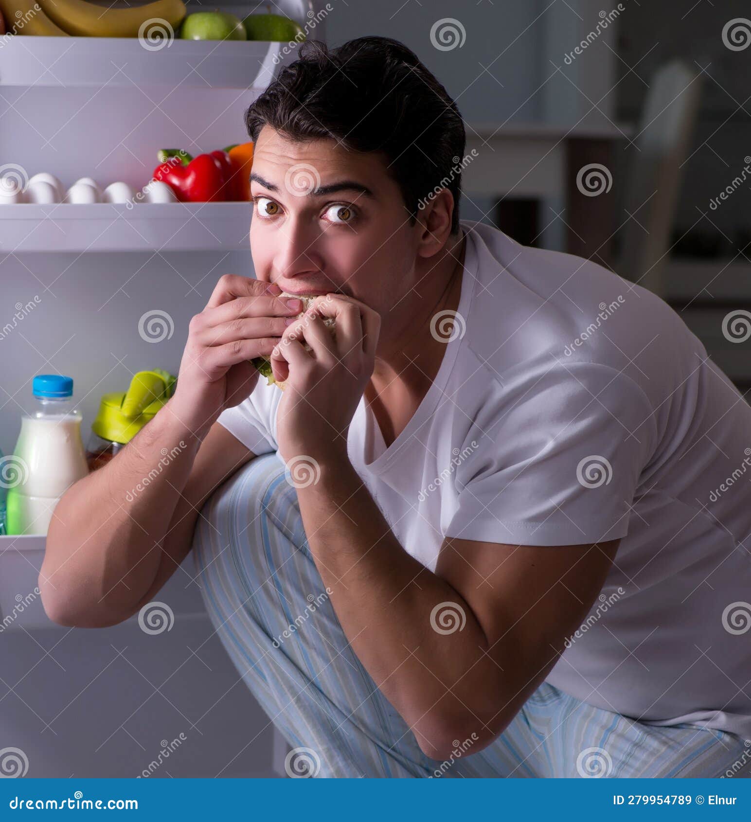 Man at the Fridge Eating at Night Stock Image - Image of food, excited ...