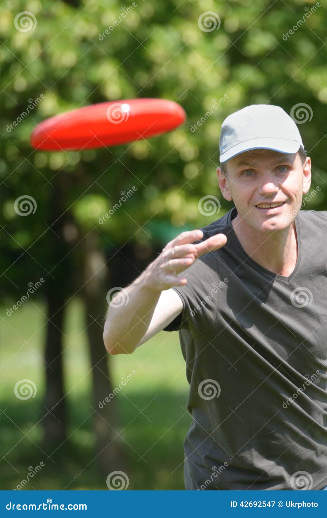 Man with frisbee stock image. Image of flying, mature - 42692547