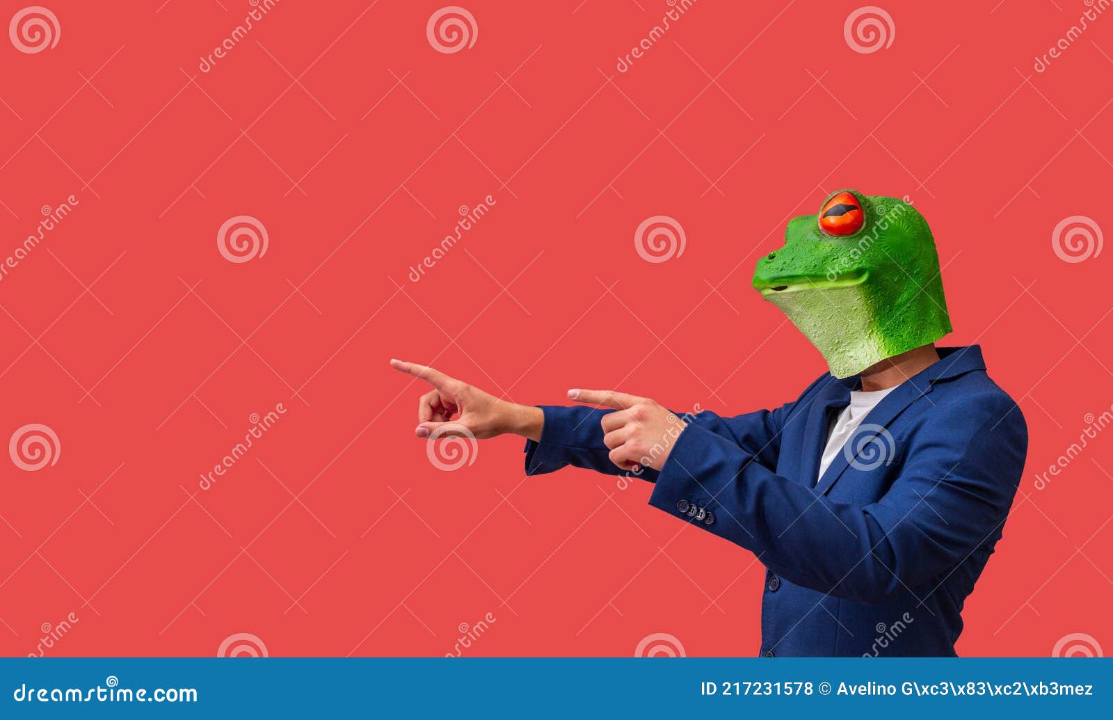 Man in Frog Mask with Bulging Eyes Looking and Pointing with Both Hands ...