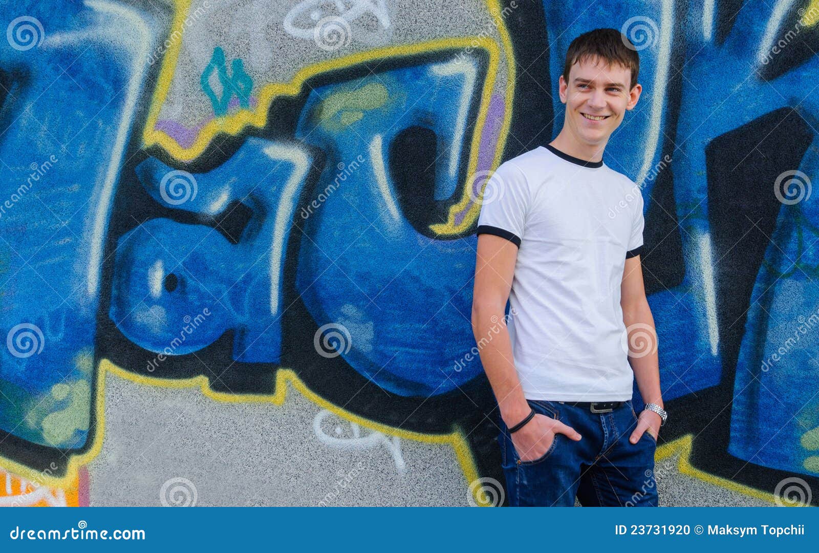 Man in front of graffiti editorial image. Image of happiness - 23731920