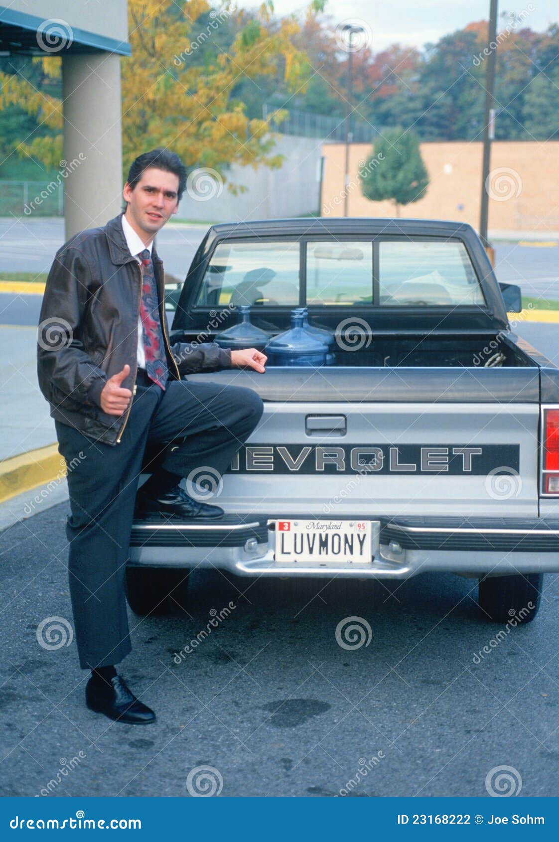 Man in front of his car editorial photography. Image of roadway - 23168222
