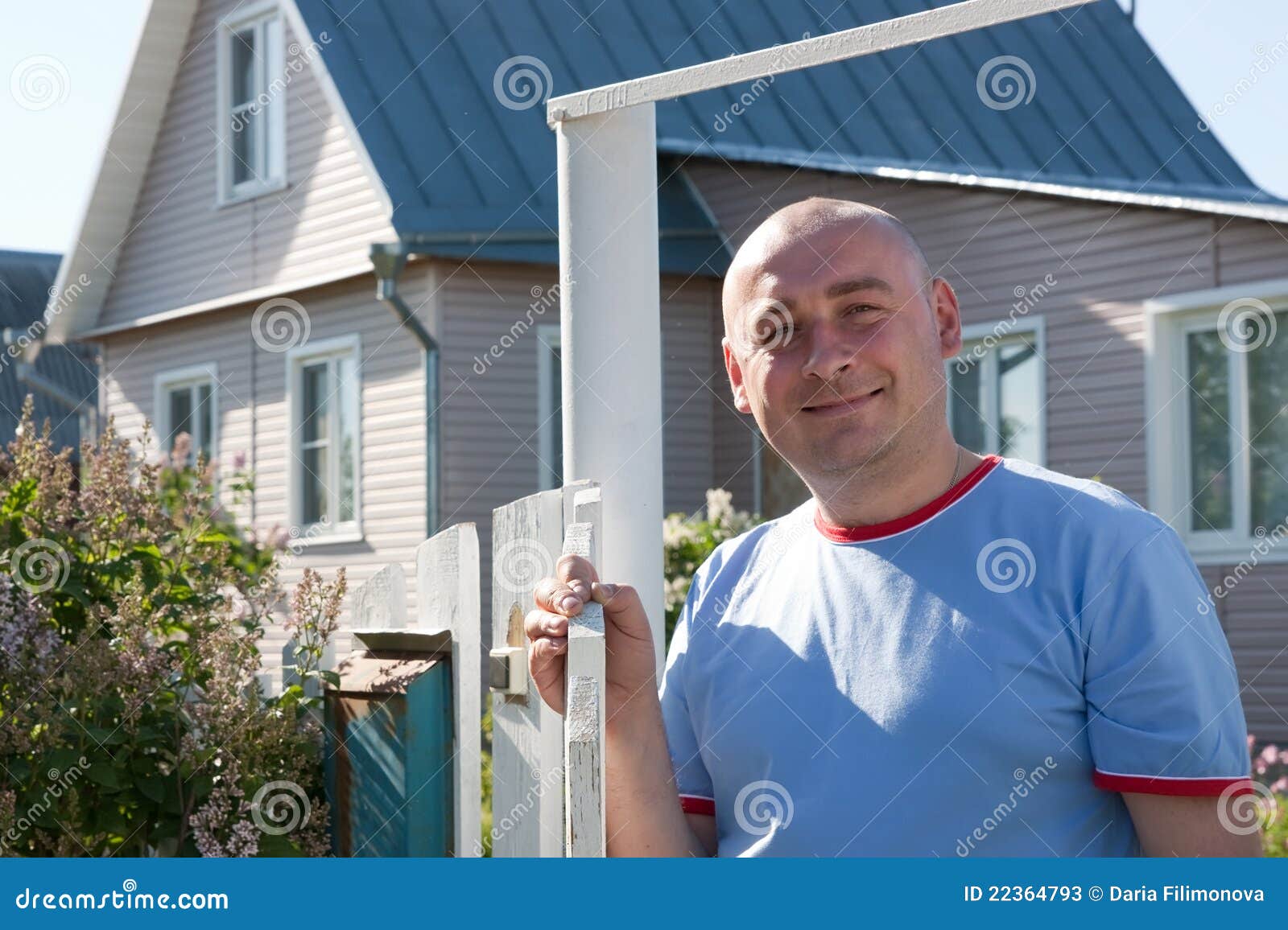 Man in front of his house stock image. Image of looking - 22364793