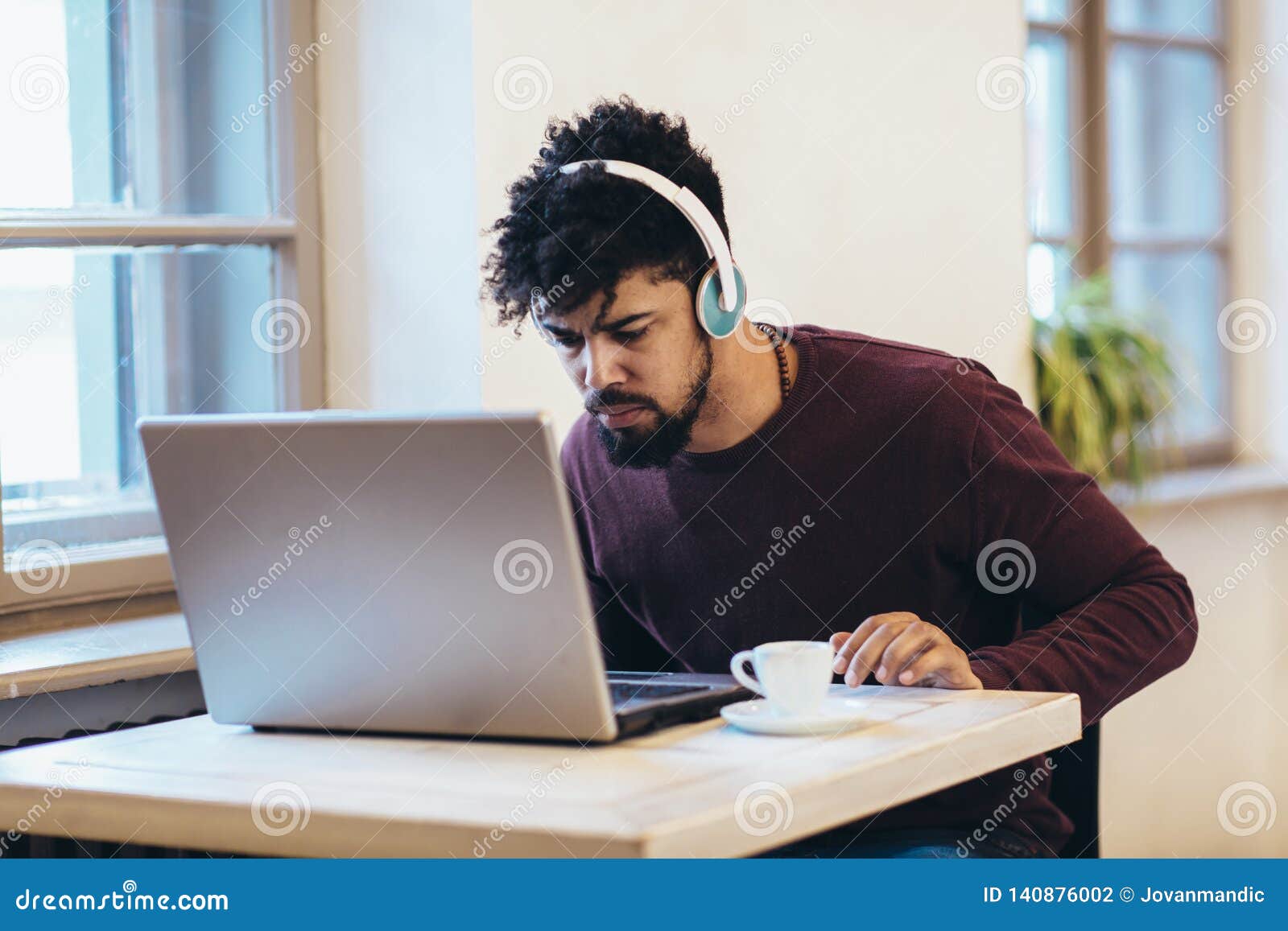 Man in Front of Laptop Computer with Headset Stock Photo - Image of ...