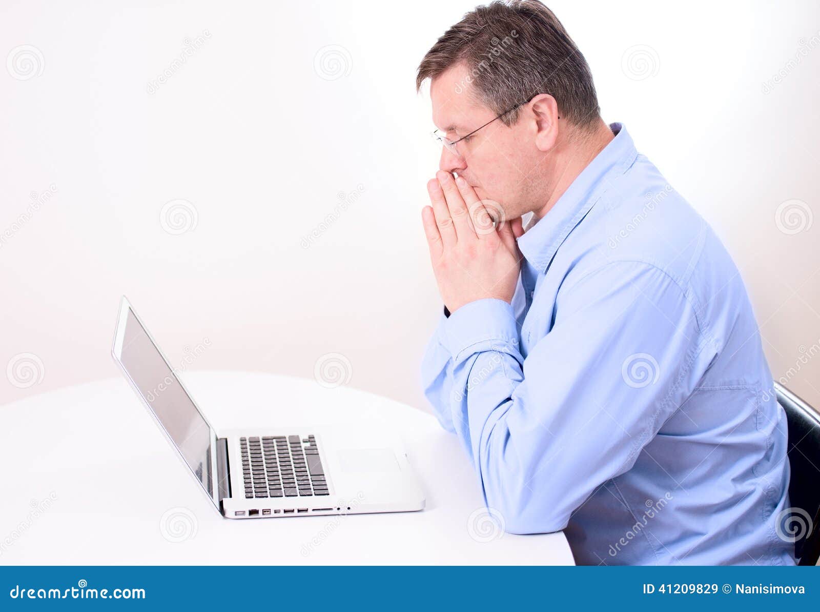 Man on front of laptop stock image. Image of glasses - 41209829