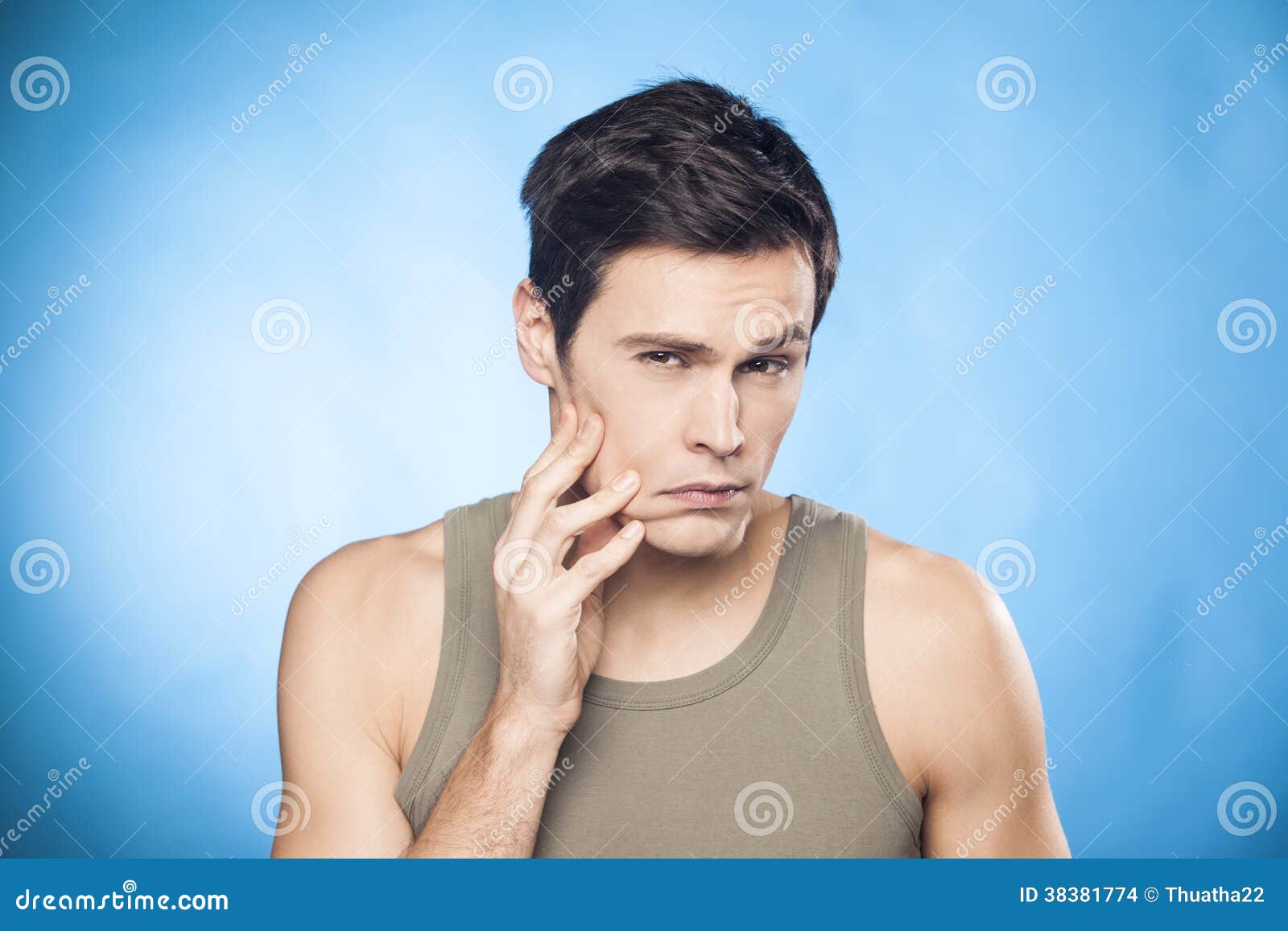 Man in Front of Mirror Looking at His Chin Checking is he Shaved Stock ...