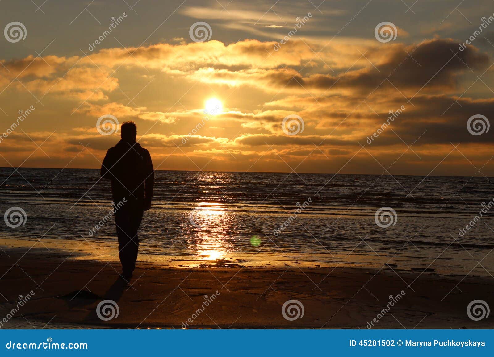 Man in front of sea sunset stock photo. Image of coast - 45201502
