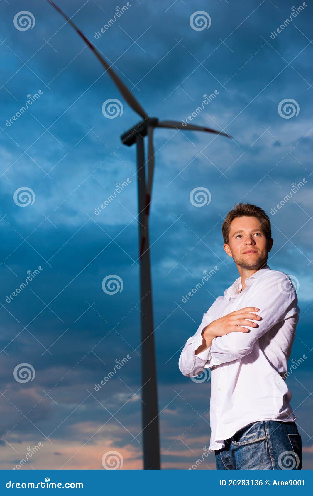 Man in Front of Windmill and Sky Stock Photo - Image of powerful ...