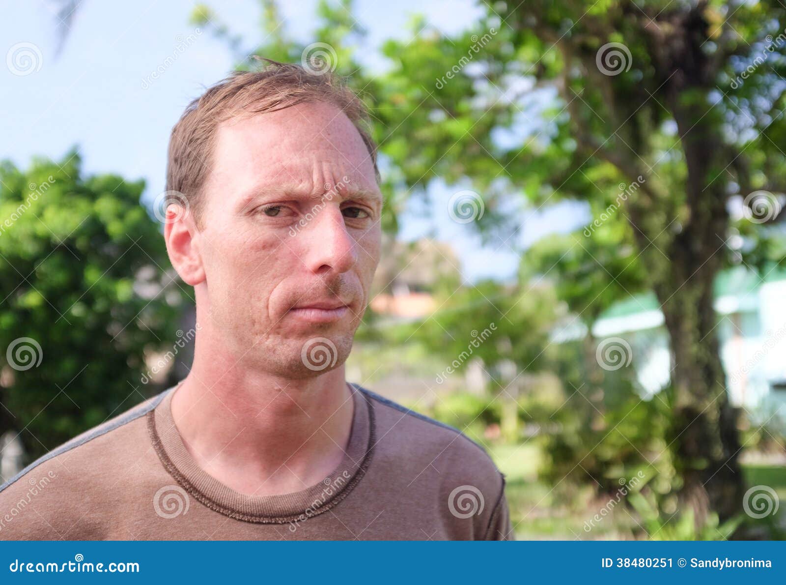 Man frowning doubtful stock image. Image of headshot - 38480251
