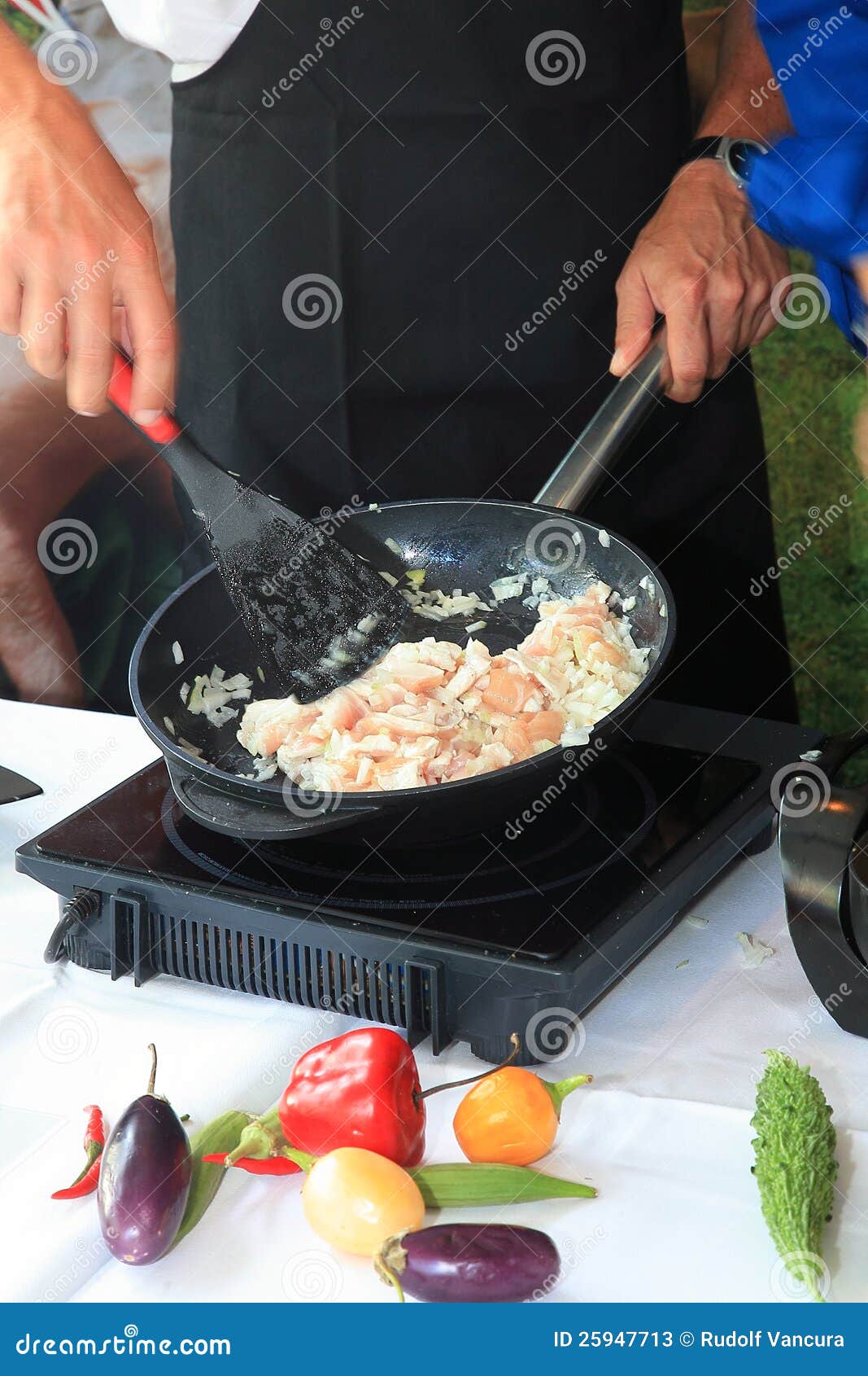 Man Frying Chicken and Onions Stock Image - Image of eggplant, outdoors ...