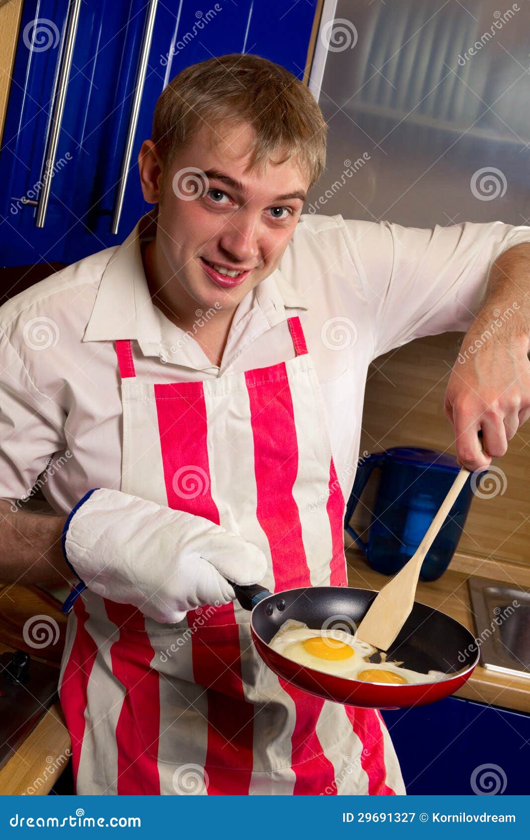 Man frying eggs stock image. Image of breakfast, food - 29691327
