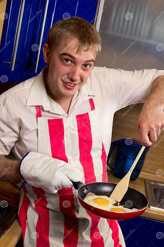 Man frying eggs stock image. Image of breakfast, food - 29691327
