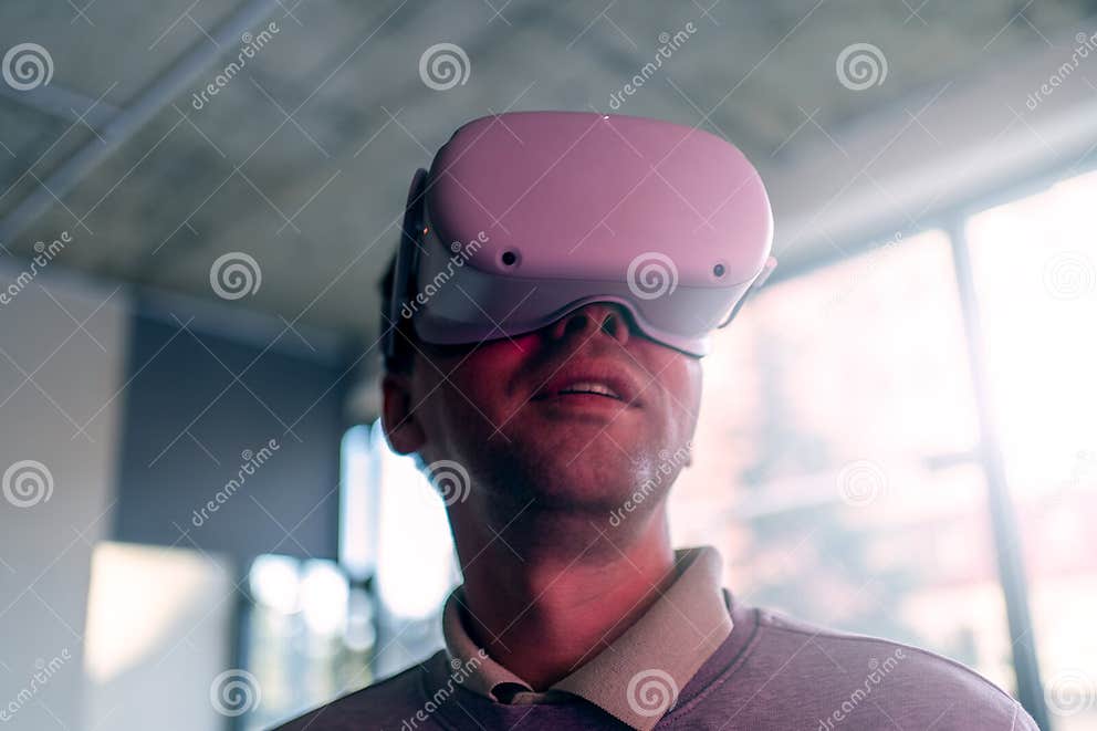 Man Fully Immersed in Virtual Reality Experience Stock Image - Image of ...