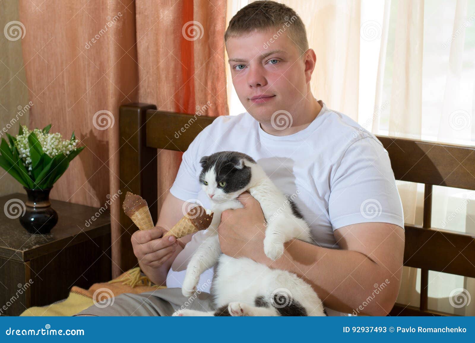 Man and Funny Cat Eating Ice Cream Cone in the Bed Stock Image - Image ...