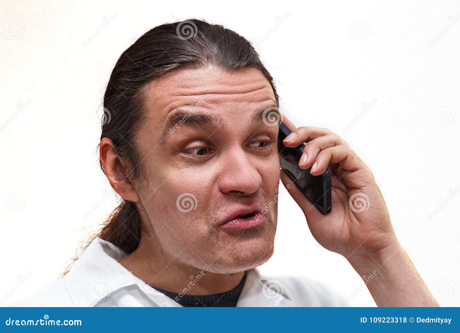 Man with Funny Face Talking on the Smartphone Stock Photo - Image of ...