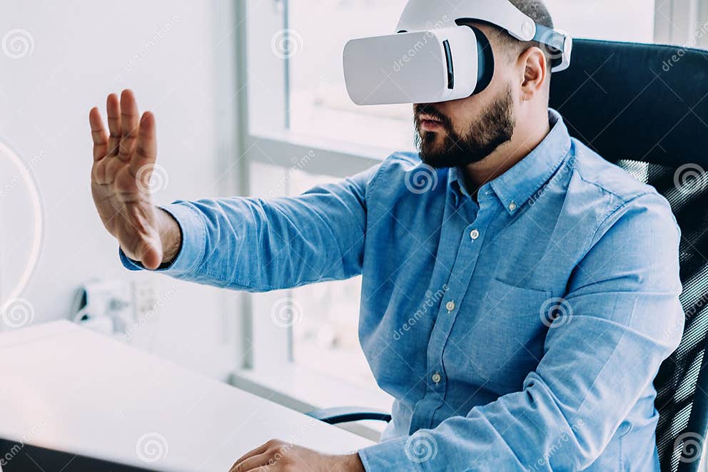 Man in Futuristic VR Goggles Using Invisible Interface Stock Image ...