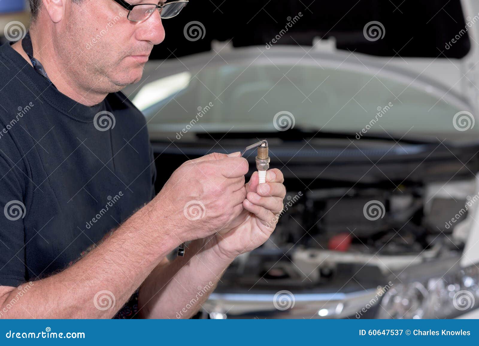 Man Gaps a Spark Plug for a Car Stock Image - Image of preventative ...