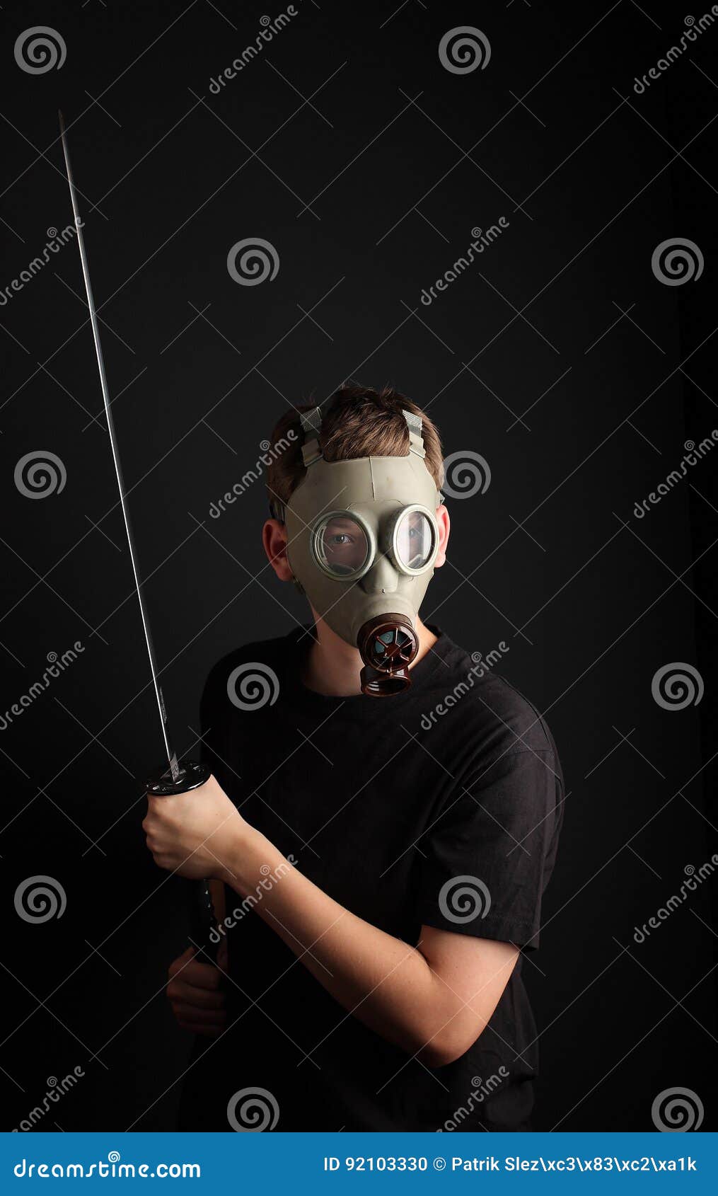 Man with Gas Mask and Katana Sword on Black Background Stock Photo ...