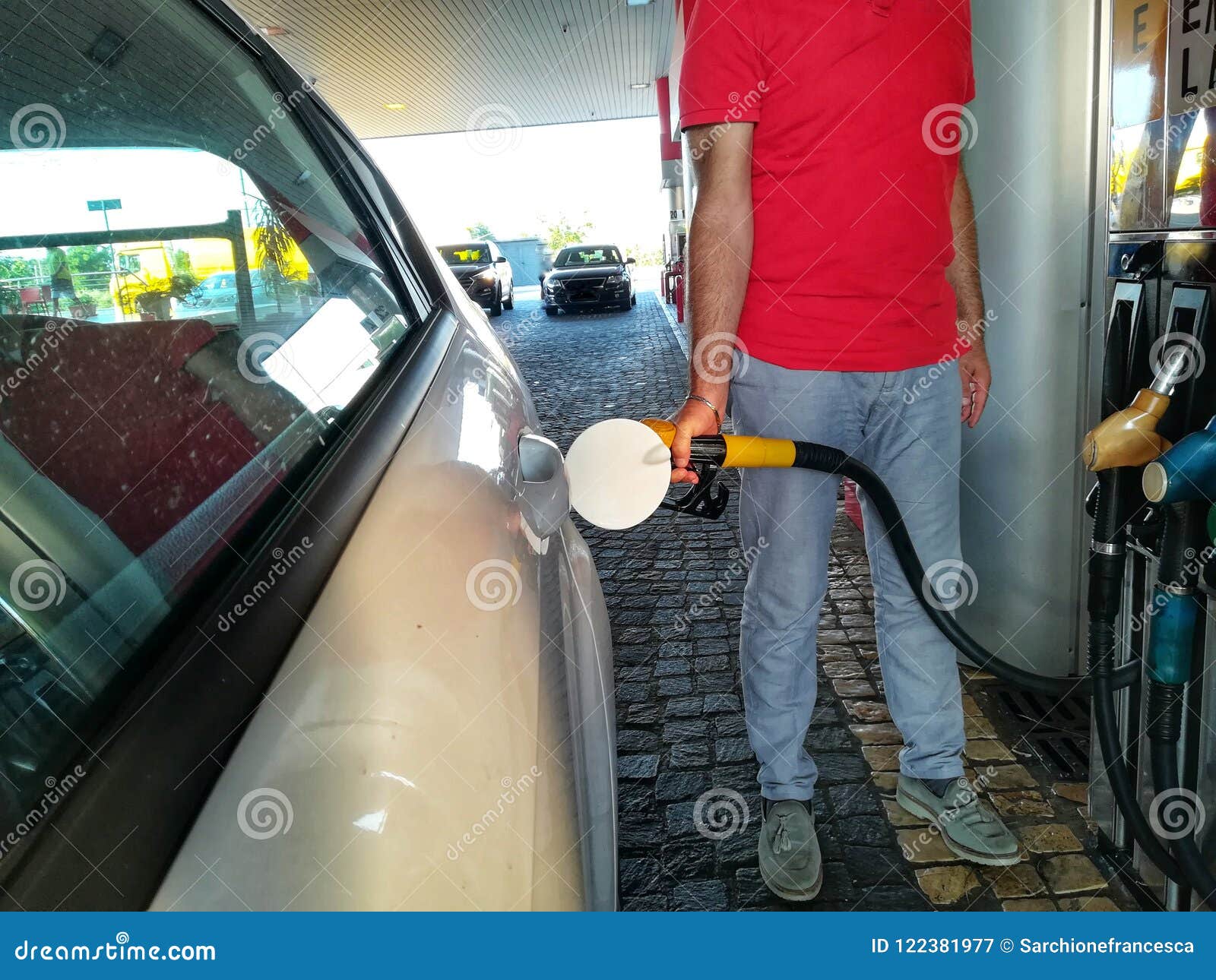 Man with Gas Pump in His Hand Stock Image - Image of hand, gasolinepump ...