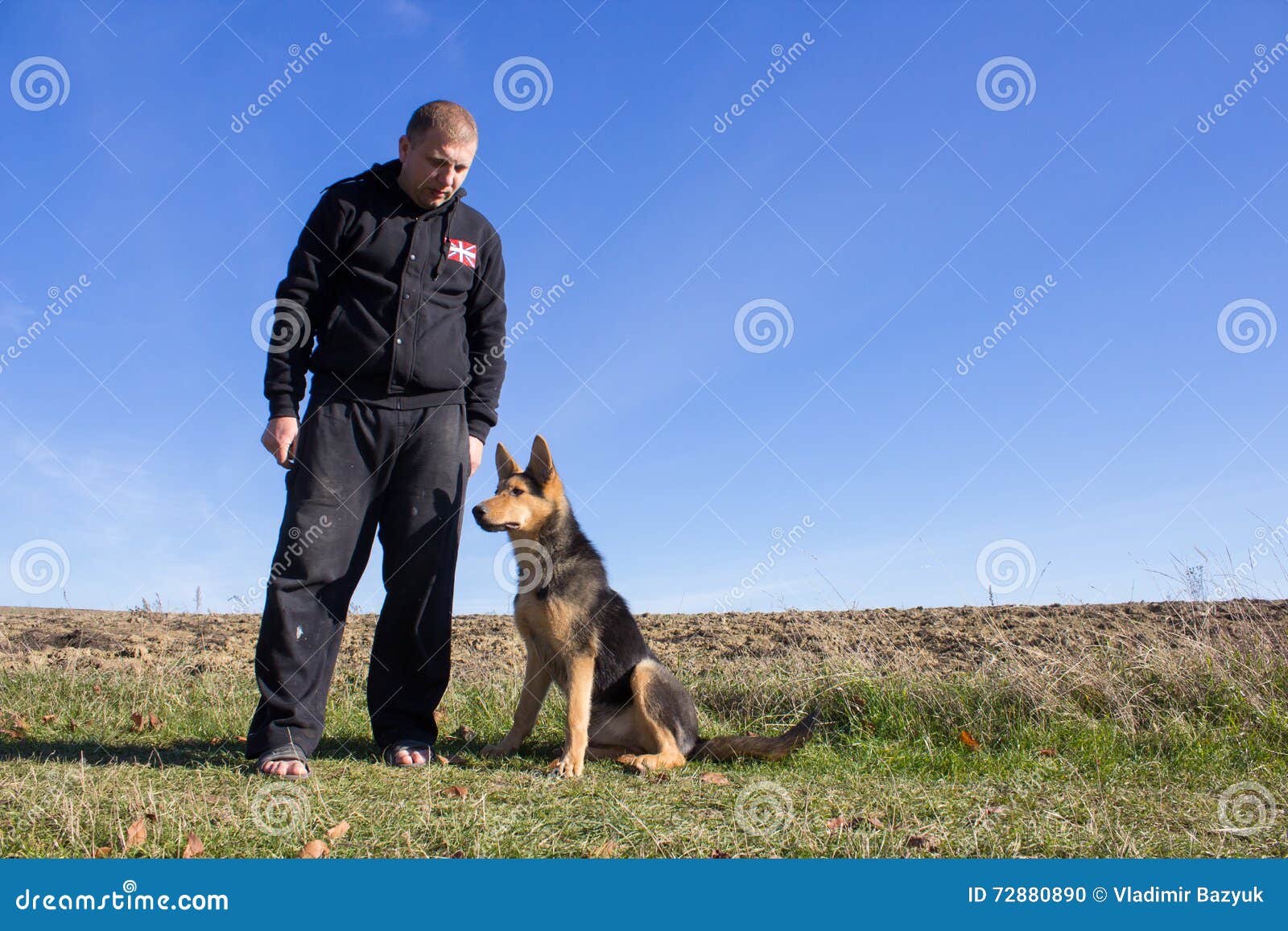 A Man with a German Shepherd Stock Photo - Image of person, animal ...