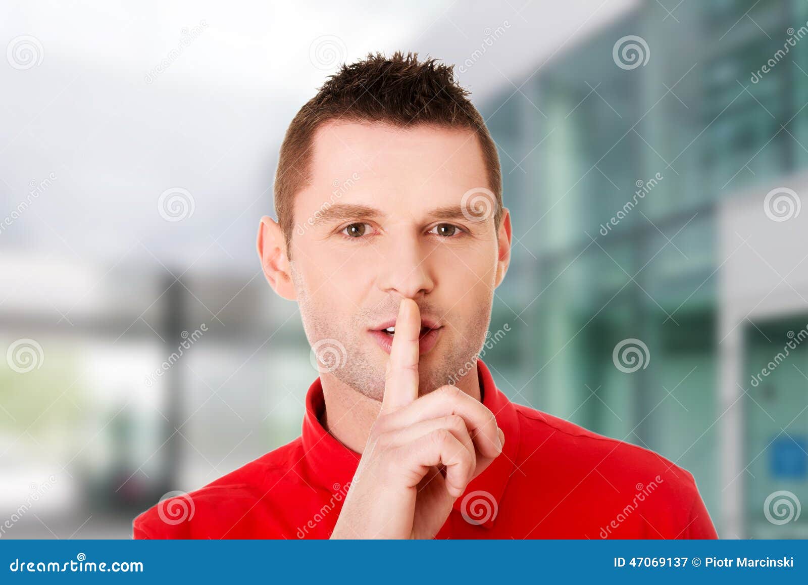 Man gesturing to be quiet stock image. Image of professional - 47069137