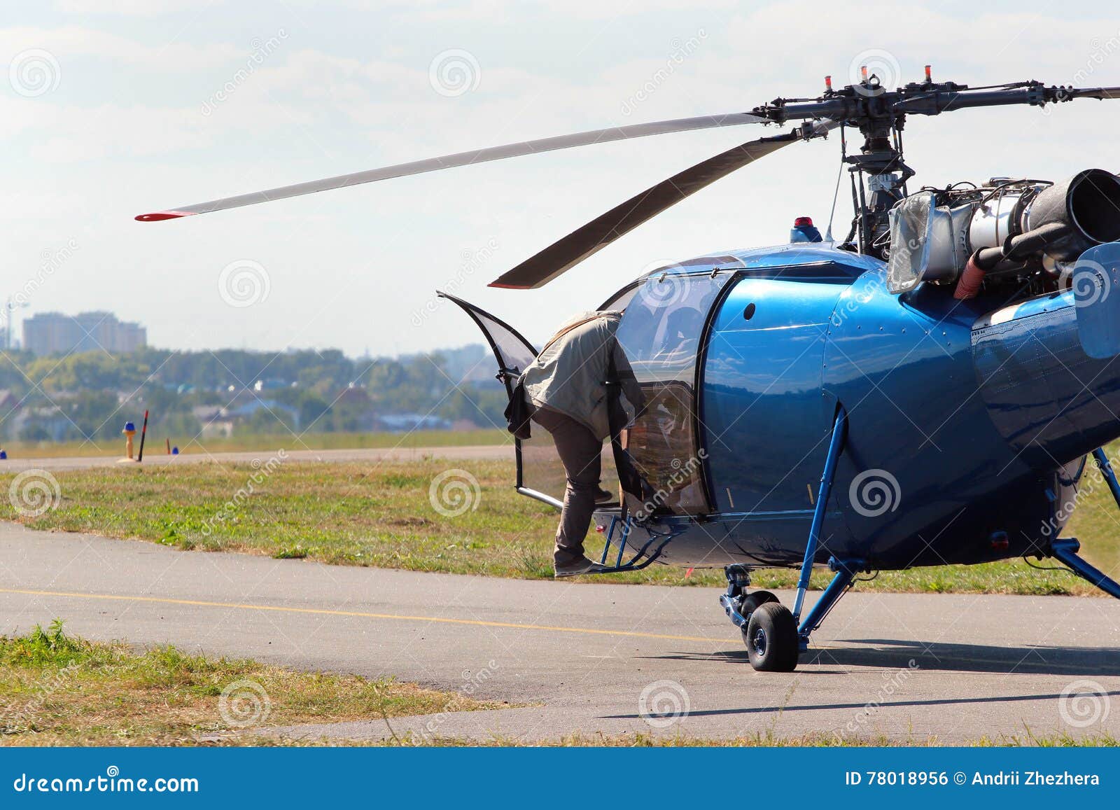 Man Getting on Board the Light Helicopter Stock Photo - Image of board ...