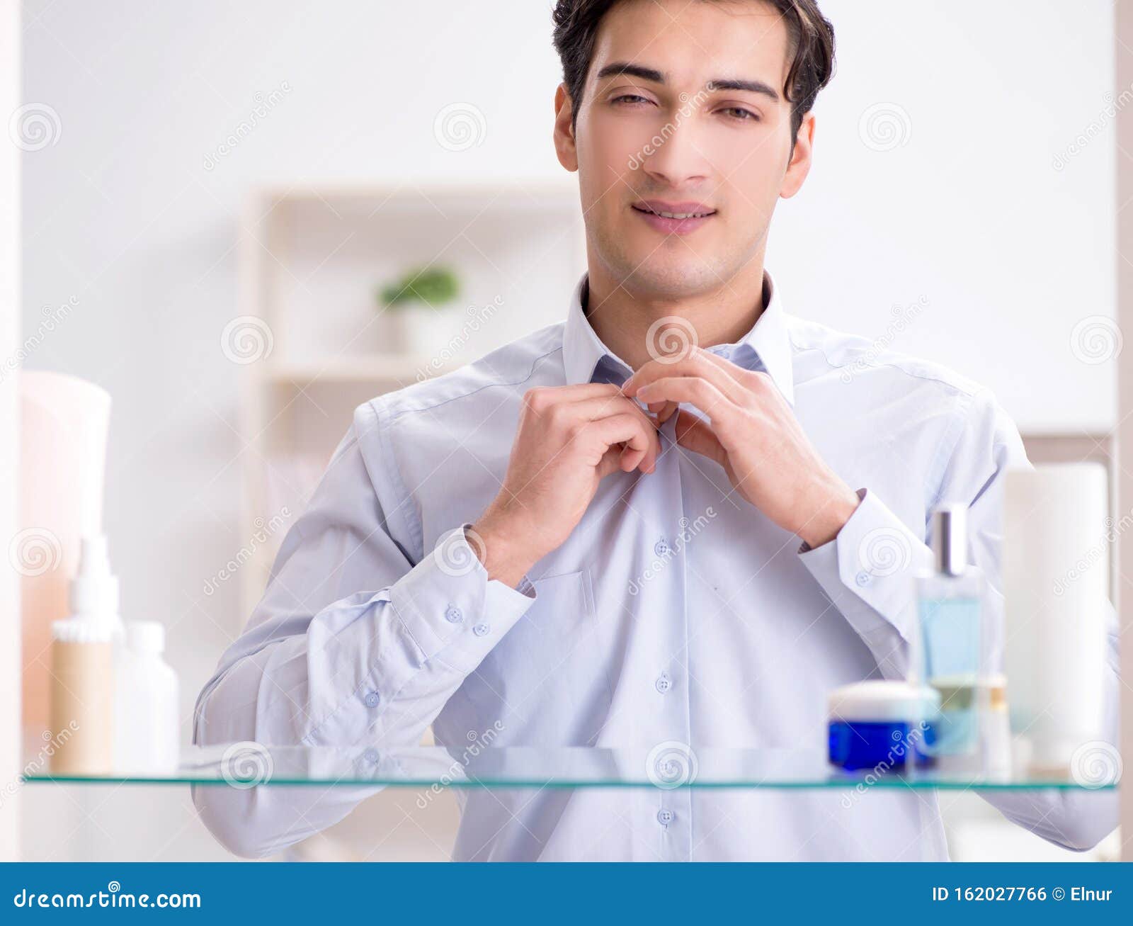 Man is Getting Dressed Up for Work in Bathroom Stock Photo - Image of ...