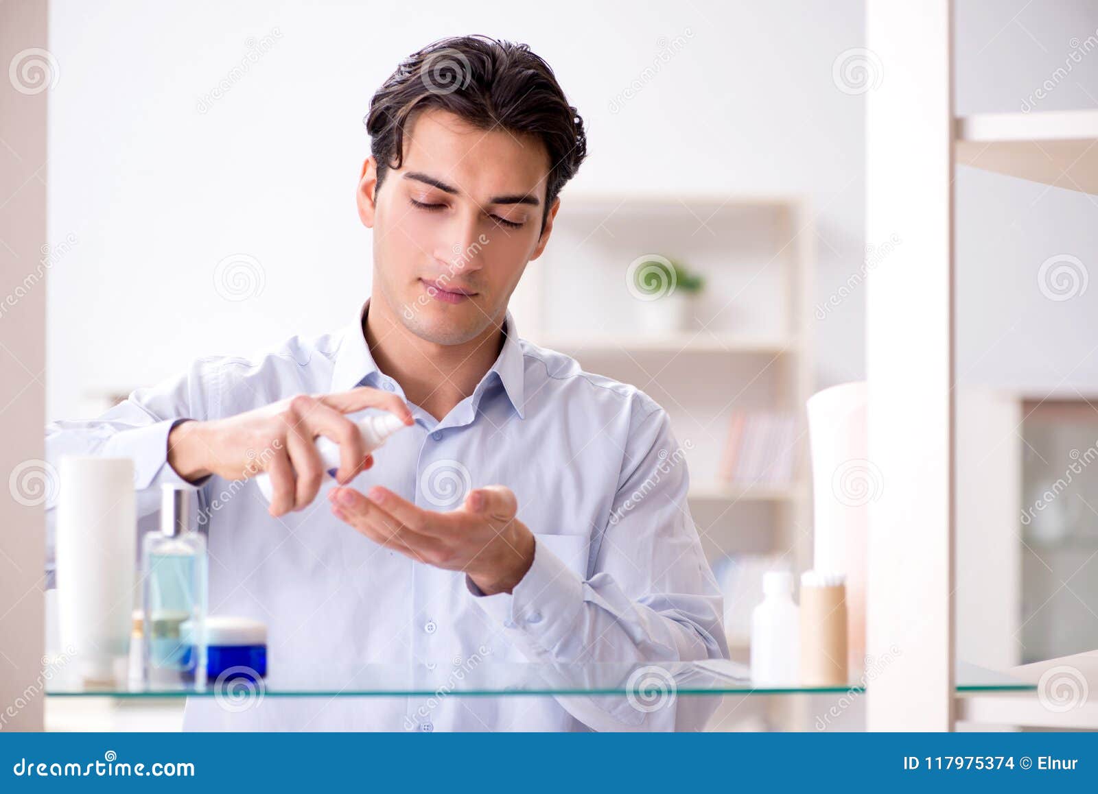 The Man is Getting Dressed Up for Work in Bathroom Stock Photo - Image ...