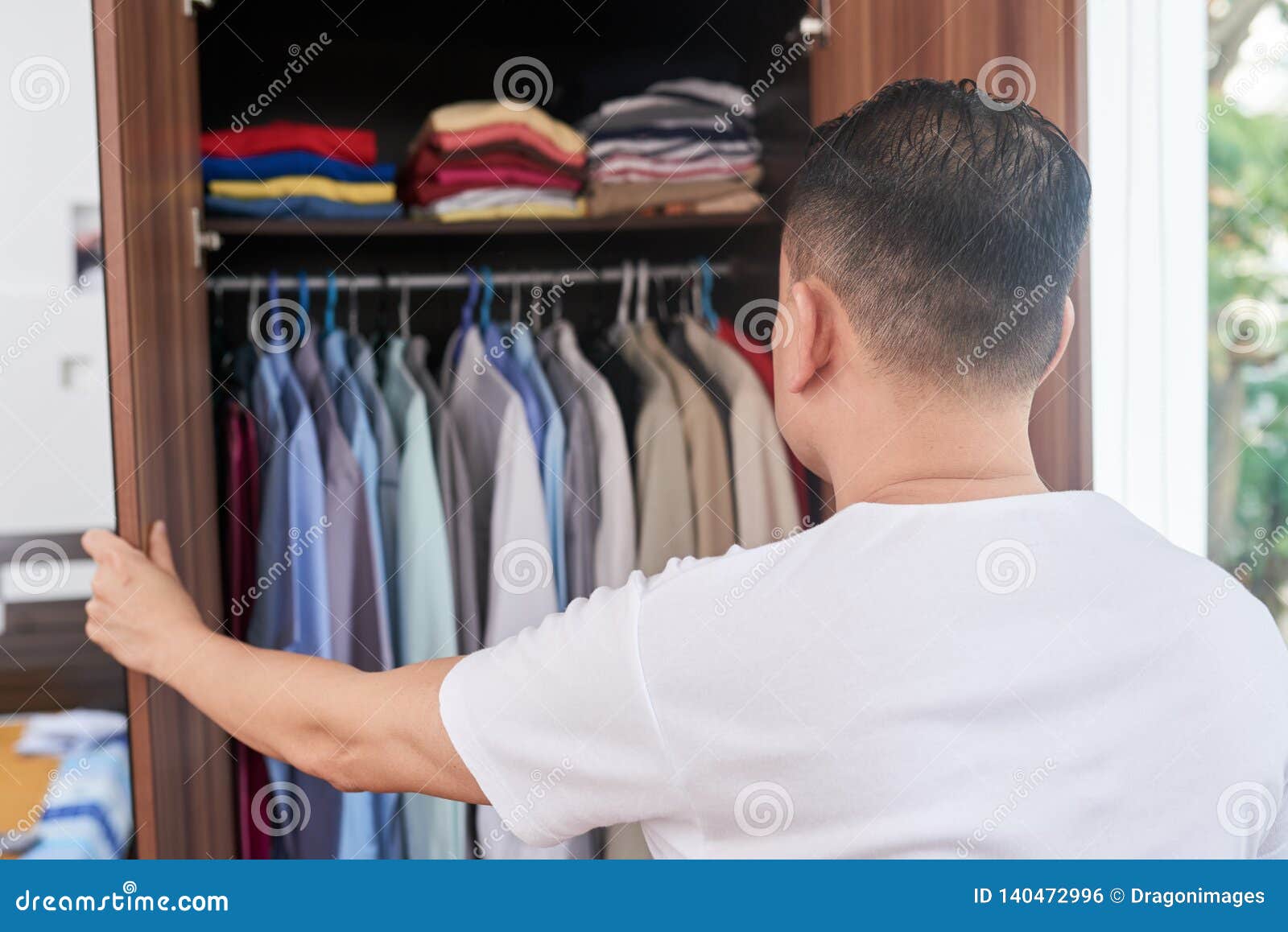 Man Getting Dressed for Work Stock Photo - Image of indoor, dressing ...