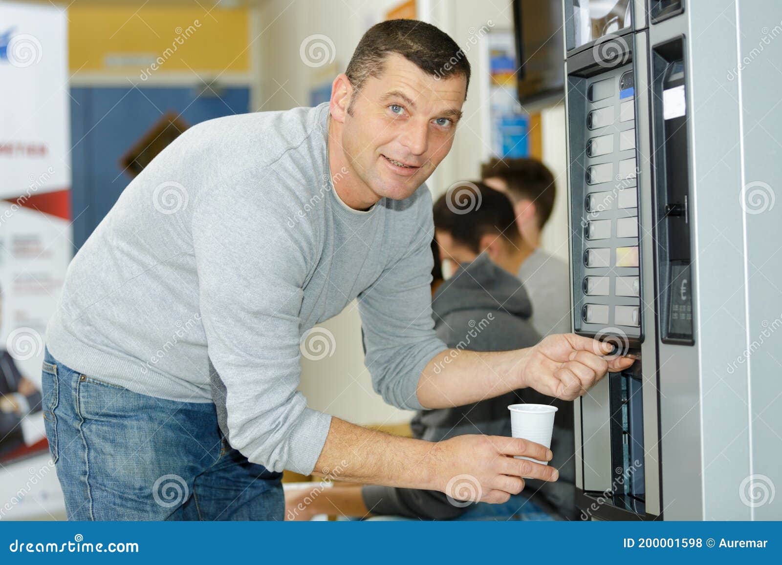 Man Getting Drink from Vending Machine Stock Photo - Image of bending ...