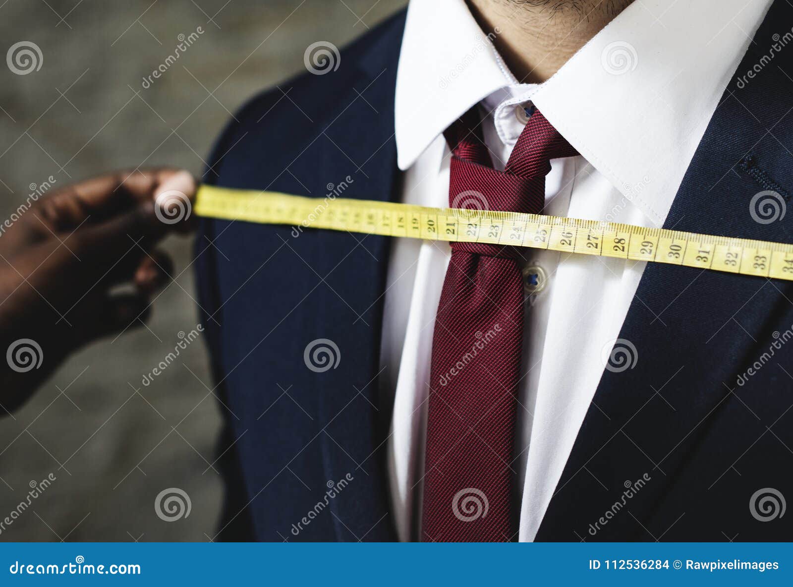 Man Getting His Measurements Done Stock Photo - Image of avian, branch ...