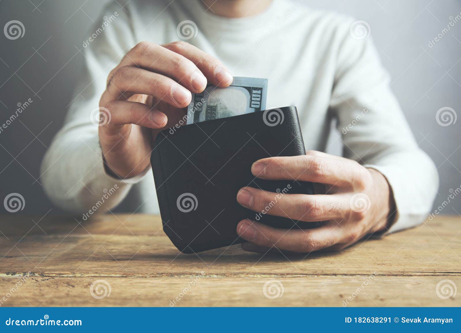Man Getting Money Out of His Wallet Stock Image - Image of present ...