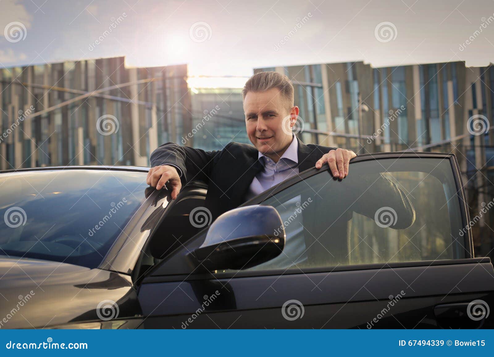 Man getting out of a car stock image. Image of reach - 67494339