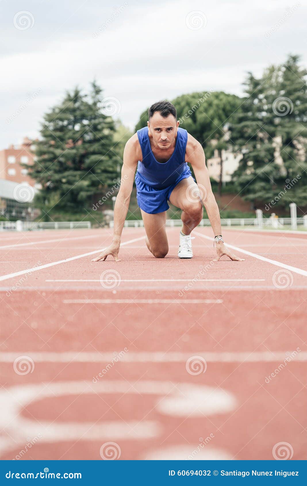 Man Getting Ready To Start Running. Stock Photo - Image of black, field ...