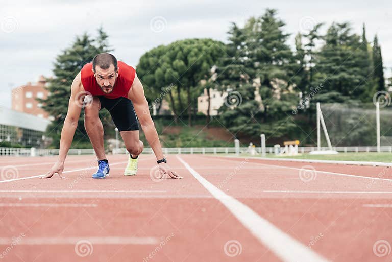 Man Getting Ready To Start Running. Stock Image - Image of starting ...